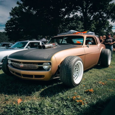 Rat Rod Style Car in Grass: Vintage and Heavily Modified | Idyllic