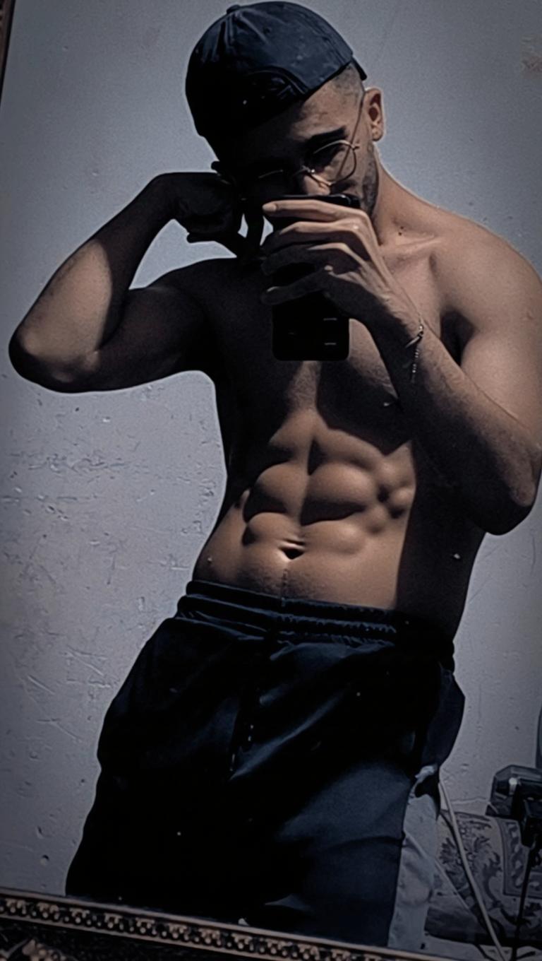Unleash Your Potential: Young Man with Impressive Six-Pack Abs