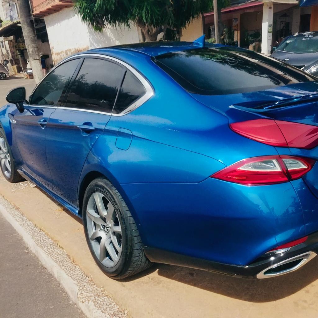 Stunning Blue Sports Car Under the Sun - A Dynamic Perspective