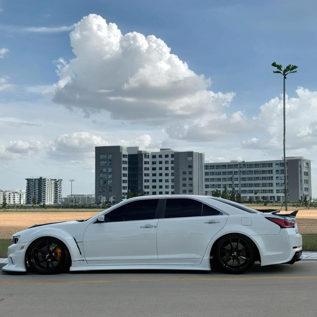 Sleek Custom Wide-Body Car in Urban Setting
